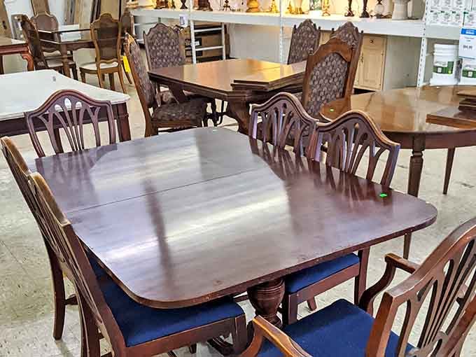 Dining tables with stories to tell. That mahogany beauty has probably hosted everything from Thanksgiving dinners to late-night poker games.