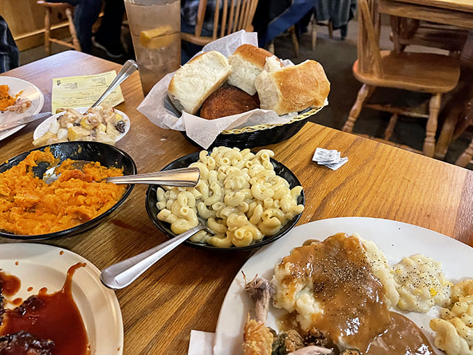 Mac and cheese so perfectly creamy it should have its own Instagram account, sitting alongside sweet potato casserole that's practically dessert in disguise.