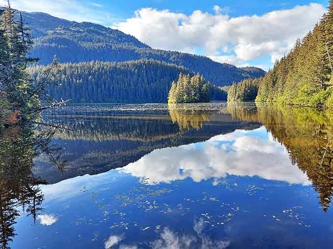 When the forest holds its breath, this alpine lake becomes nature's most perfect mirror&mdash;no filter needed, no photoshop required.