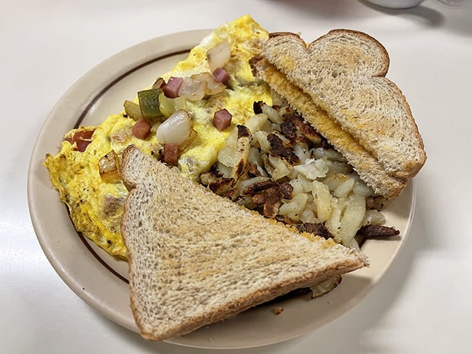 This isn't just an omelet&mdash;it's a masterclass in how simple ingredients become extraordinary when treated with respect and a little griddle magic.