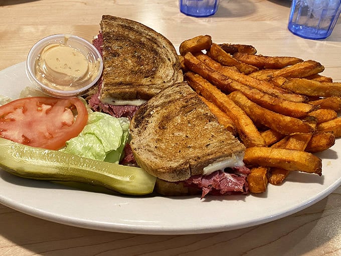 The classic Reuben with sweet potato fries &ndash; proof that sometimes the simplest pleasures are still the most satisfying.