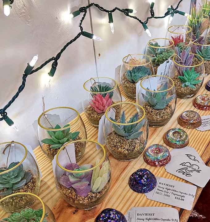 Even modern succulents get the vintage treatment here, nestled in glassware that probably witnessed many a 1960s cocktail party.