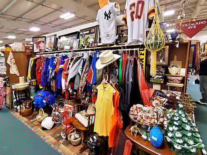 Vintage jerseys and colorful apparel hang like ghosts of fashion past. That cowboy hat is just waiting for its next rodeo.