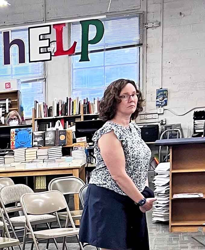 The help desk area features comfortable seating for events, where book lovers gather to share their passion for the written word.
