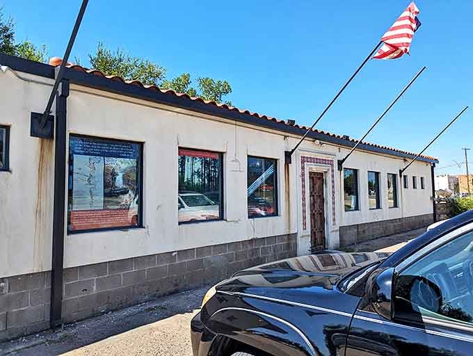 Bedlam's Spanish-style charm and American flag say it all: this is where Old World craftsmanship meets all-American barbecue tradition.