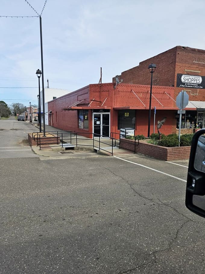 Historic brick buildings line the streets of Broken Bow, where small-town charm meets mountain getaway vibes. Like stepping into a postcard from Oklahoma's hidden alpine secret.