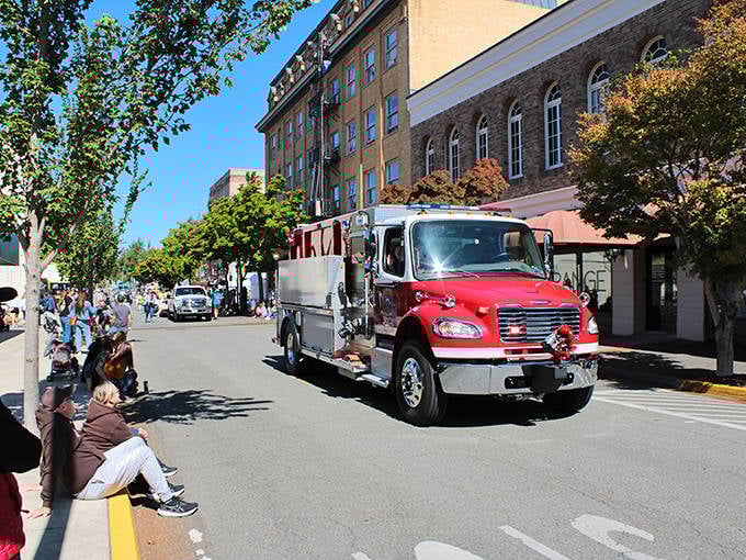 Community parades bring neighbors together on historic downtown streets where everyone knows their local firefighters by name.