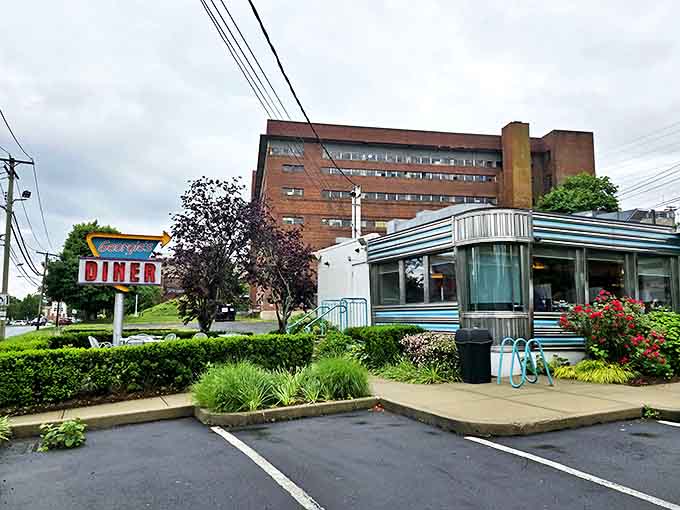 Georgie's Diner sits like a polished silver bullet ready to shoot down hunger. The classic curved windows promise views of both West Haven and your overflowing plate.