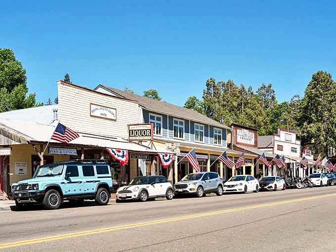 Julian's Old West charm shines through in these historic storefronts, where American flags wave proudly above wooden sidewalks.