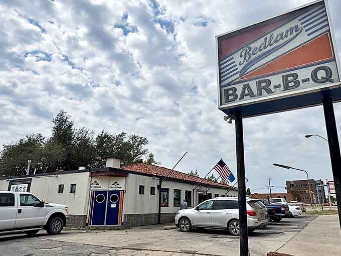 The white stucco exterior might whisper "Southwest," but the aromas wafting from inside scream "Oklahoma barbecue royalty."