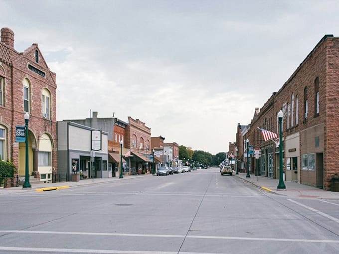 Wide streets and brick storefronts create the perfect small-town atmosphere where everyone still waves hello and knows your name by lunchtime.