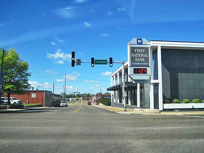 Forrest City's quiet main street with First National Bank offers small-town charm while keeping daily expenses manageable.