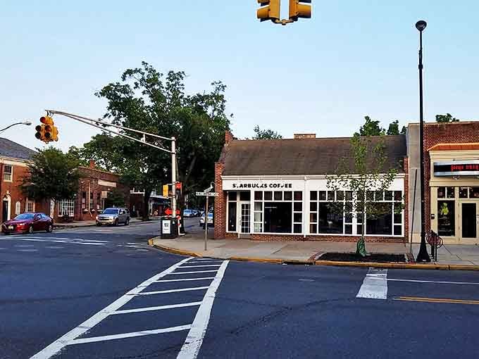 A quiet Haddonfield intersection shows the town's relaxed pace, where even busy corners maintain their small-town charm and character.