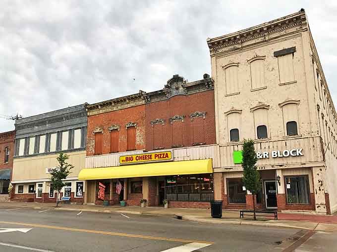 Explore the charming streets of Independence, Kansas, where historic brick buildings and local shops create a warm, inviting community atmosphere.