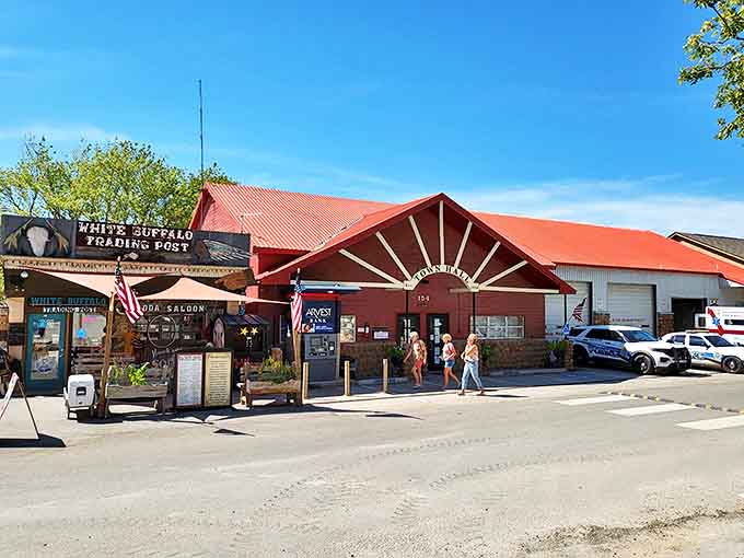 Experience the friendly spirit of Medicine Park at the Town Hall and White Buffalo Trading Post on a sunny day.