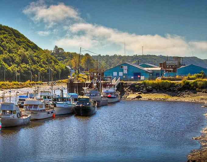 Where land meets water in Ninilchik – fishing boats rest peacefully in a harbor that's been supporting locals for generations.