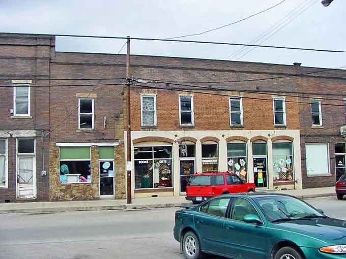 Olive Hill's historic brick storefronts offer affordable small-town charm where local businesses serve generations of Kentucky residents.