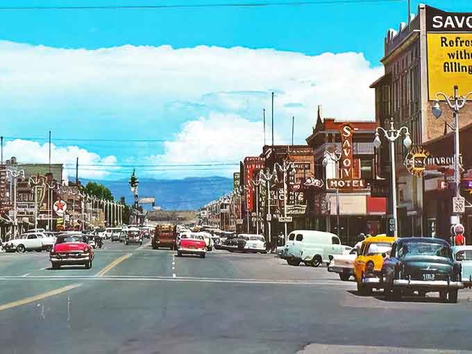 This vintage scene of Price captures an era when cars had fins and downtown was everyone's Saturday destination.