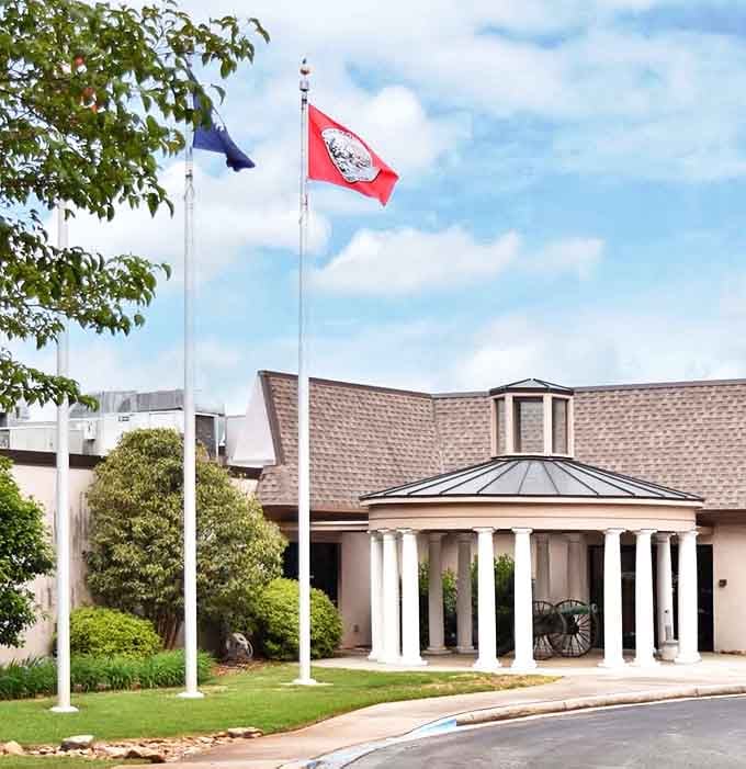 The Anderson County Museum's columned entrance stands as a dignified gateway to local history. Where the past gets the respect it deserves, minus the dusty textbook feel.