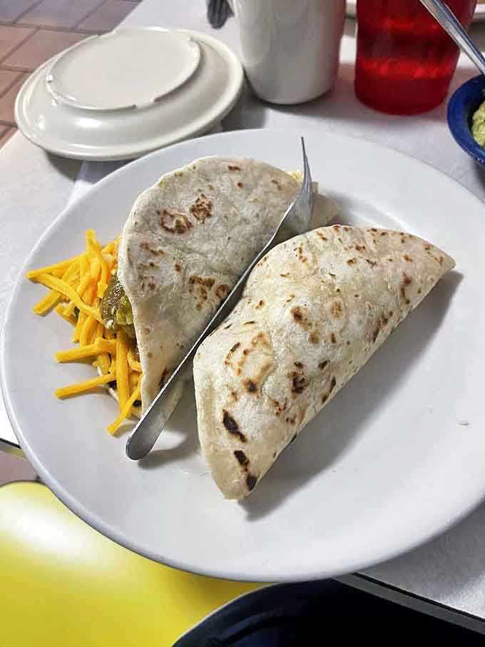 Breakfast tacos that could end wars&mdash;simple flour tortillas cradling cheese and fillings, proof that sometimes the most basic pleasures are life's greatest luxuries.