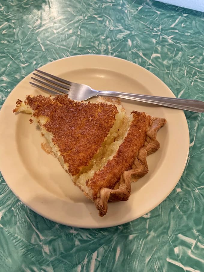 A slice of buttermilk pie that whispers sweet nothings to your taste buds&mdash;the crispy brown sugar top giving way to a custard so silky it should be illegal.