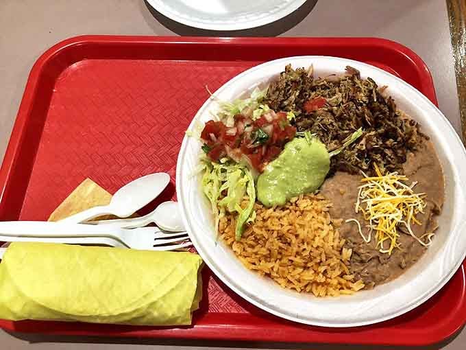 The carnitas bowl&mdash;where rice, beans, meat, and toppings live together in perfect harmony, showing politicians everywhere how it's done.
