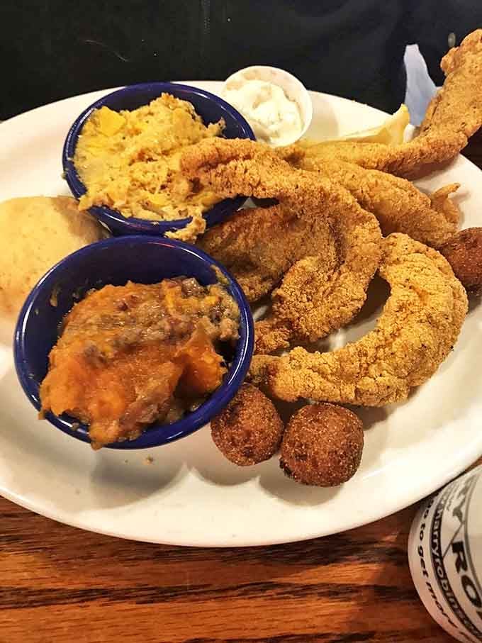 Golden-fried catfish that would make a fisherman proud, surrounded by sides that aren't afterthoughts but co-stars in this Southern comfort production.