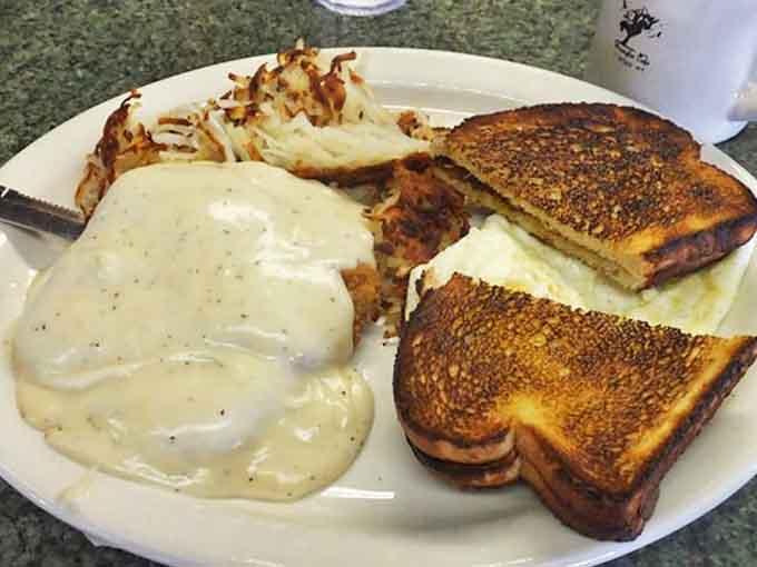 Chicken fried steak smothered in gravy that could make a vegetarian question their life choices. This isn't diet food&mdash;it's happiness on a plate.