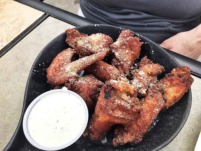 Wings that don't need a sporting event as an excuse. These crispy, sauce-kissed beauties demand your full attention and possibly an extra napkin or three.