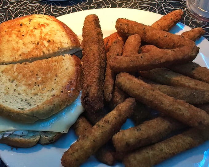 This grilled sandwich, loaded with melty cheese and served with crispy onion rings, makes you wonder why astronauts bother with freeze-dried anything.