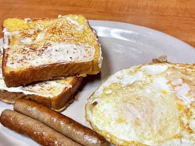 French toast that achieves that perfect balance between crispy exterior and custardy interior &ndash; breakfast architecture at its finest.