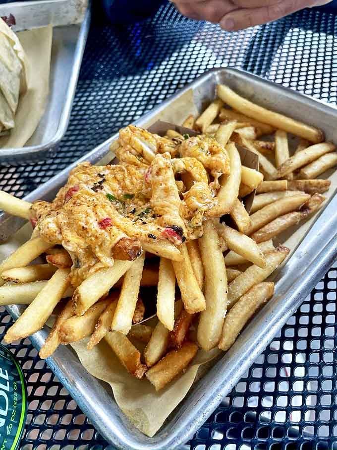 Golden, hand-cut fries achieve that mythical balance &ndash; crispy exterior, fluffy interior, and seasoned with what can only be described as magic.