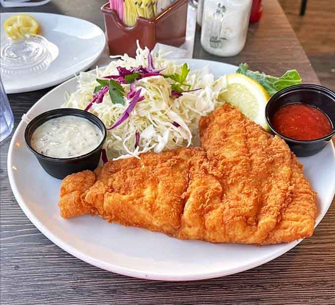 This fried flounder isn't just dinner&mdash;it's edible artwork. Perfectly golden, served with slaw that pops with color, and two dipping sauces for your dunking pleasure.