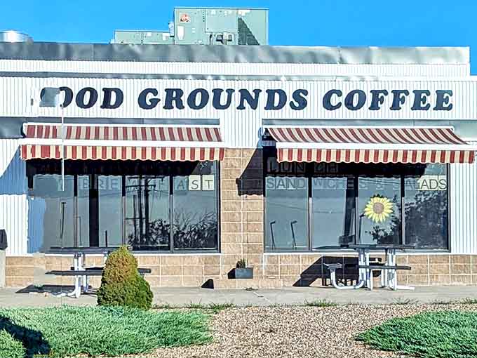 Good Grounds Coffee's striped awnings and sunflower logo invite caffeine-seekers to fuel up before exploring the High Plains.