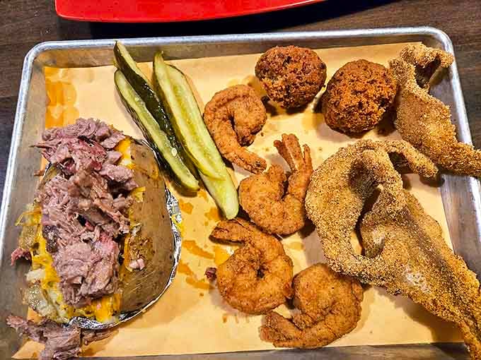 The seafood sampler that makes landlocked Arkansas feel coastal. Hush puppies, fried shrimp, and catfish create the holy trinity of Southern frying.