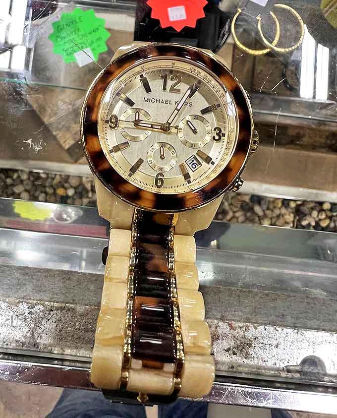 That Michael Kors watch didn't get the memo about being secondhand. Some treasures arrive barely touched by time.