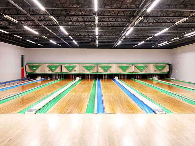 Molco Lanes' polished wooden pathways await your best roll, where strikes and spares are celebrated regardless of skill level.