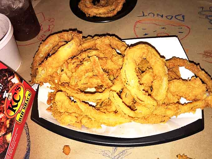 Onion rings that could double as golden halos. Crispy, substantial, and demanding to be photographed before they disappear.