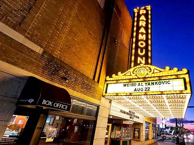 The Paramount's marquee illuminates Winchester Avenue after dark, a beacon of culture that's been drawing crowds since Herbert Hoover was president.