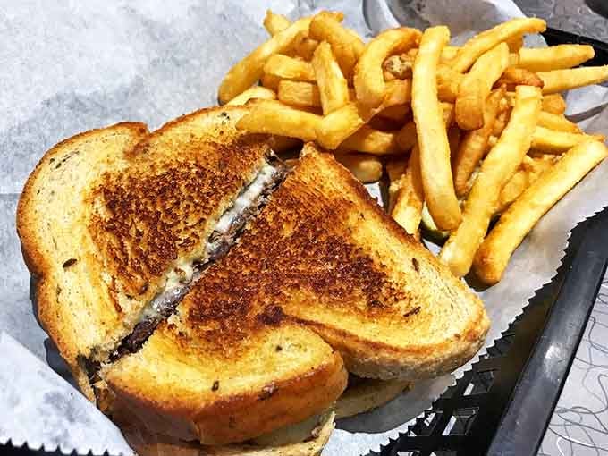 A proper patty melt should have griddle marks that look like they were applied by an artist. This one belongs in the Sandwich Hall of Fame.
