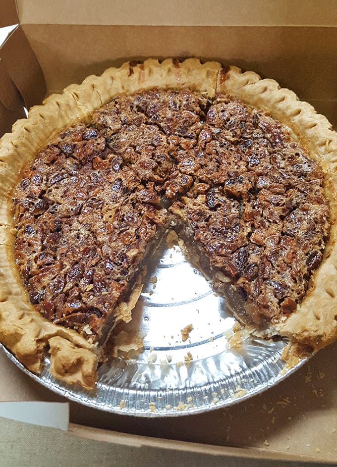 This isn't just pecan pie; it's a slice of Louisiana soul with a perfectly flaky crust and that gooey, nutty filling that dreams are made of.