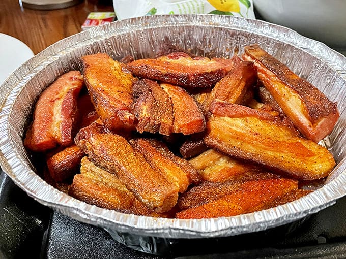 Pork belly that's been transformed into crispy, smoky perfection. Each bite is a little piece of pig candy heaven.