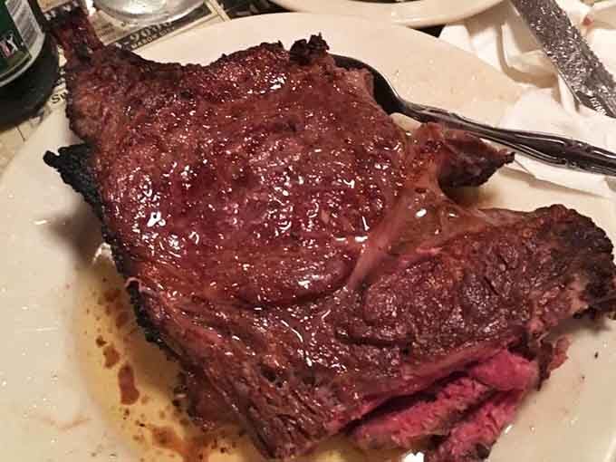 The prime rib doesn't just sit on the plate &ndash; it commands attention with its perfect pink center and savory outer crust.