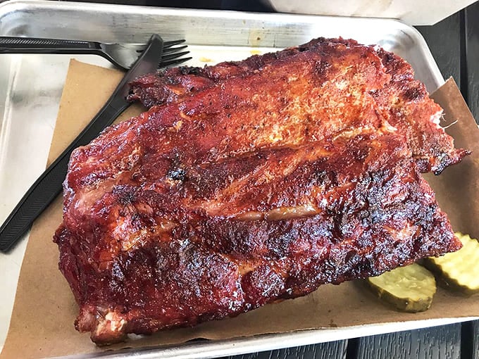 These ribs don't "fall off the bone"&mdash;they resist just enough to remind you that proper barbecue requires both science and sorcery.