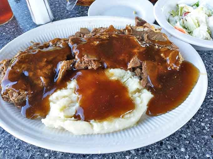 The Roast Beef Manhattan&mdash;where tender meat and mashed potatoes become islands in a sea of gravy that deserves its own area code.