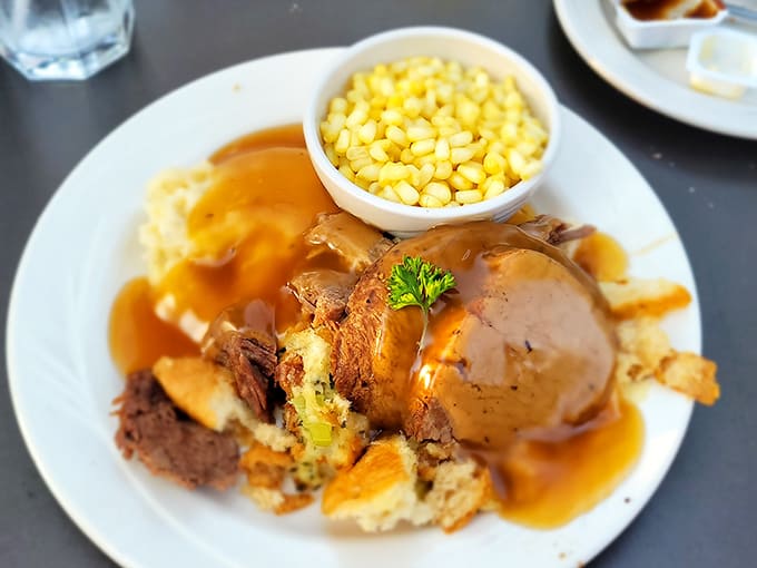 Sunday dinner perfection: tender roast beef with stuffing and gravy that would make your grandmother both proud and jealous.