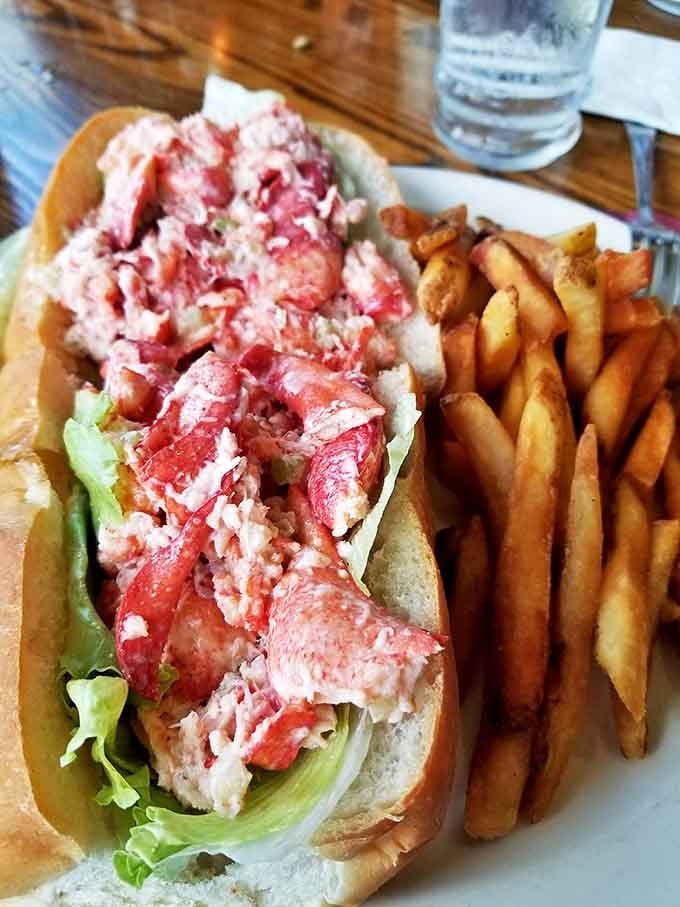 The lobster roll that launched a thousand return visits—sweet meat, minimal fuss, and fries that deserve their own fan club.