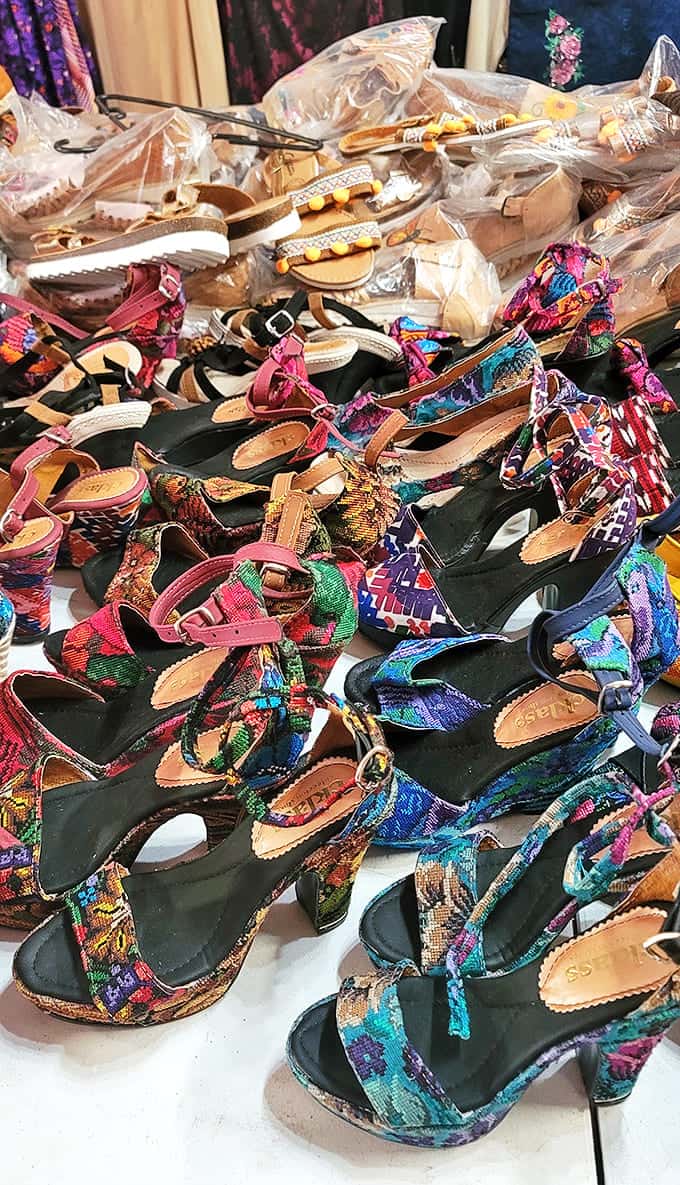 Footwear fiesta! These vibrant sandals aren't just shoes&mdash;they're wearable art pieces waiting to transform ordinary outfits into conversation starters.