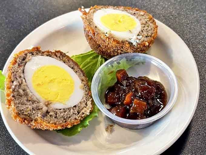 Behold the Scotch egg&mdash;Britain's contribution to perfect portable protein. A hard-boiled egg wrapped in seasoned sausage, then fried to golden perfection, served with chutney for dipping delight.