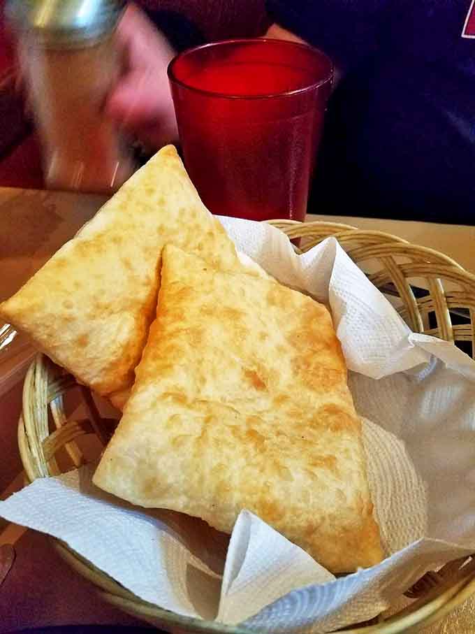 Sopaipillas: those magical pillows of fried dough that puff up like your pride when you discover them. Honey's perfect companion.